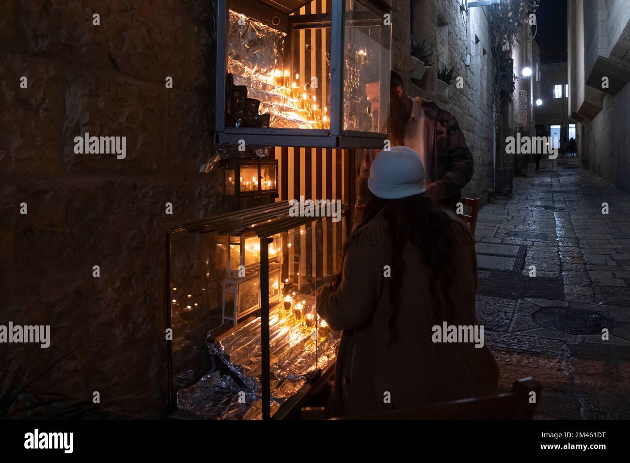 JERUSALEM, ISRAEL - DECEMBER 18: Religious Jews light Hanukkah candles ...