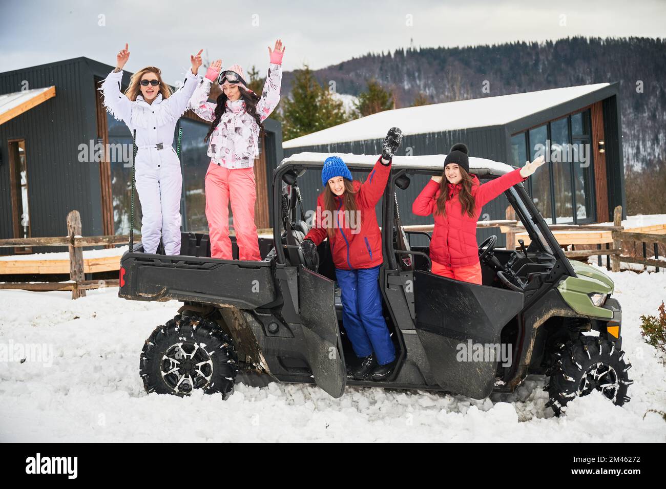Beautiful women posing on offroad four-wheeler ATV. Contemporary ...