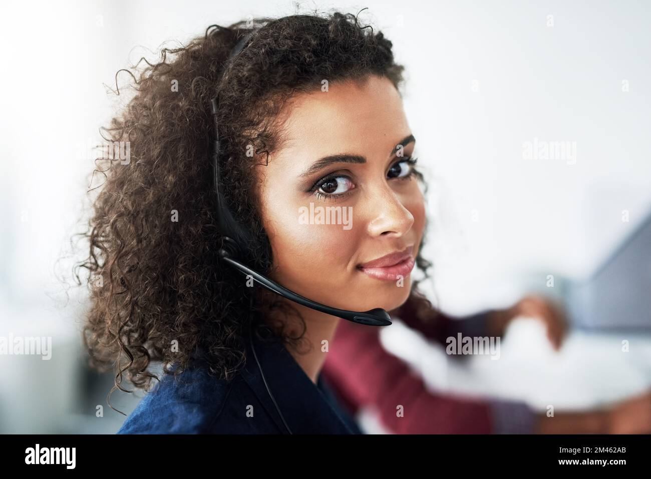 Our call center is open 247. Cropped portrait of an attractive young ...