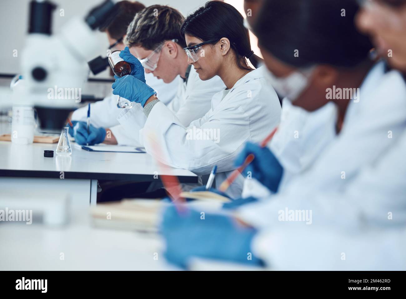 Science, education with students in lab for experiment, learning to be ...