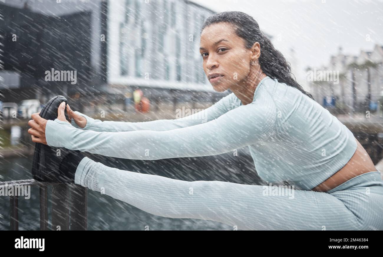 Fitness, rain or black woman stretching in city of London to start ...
