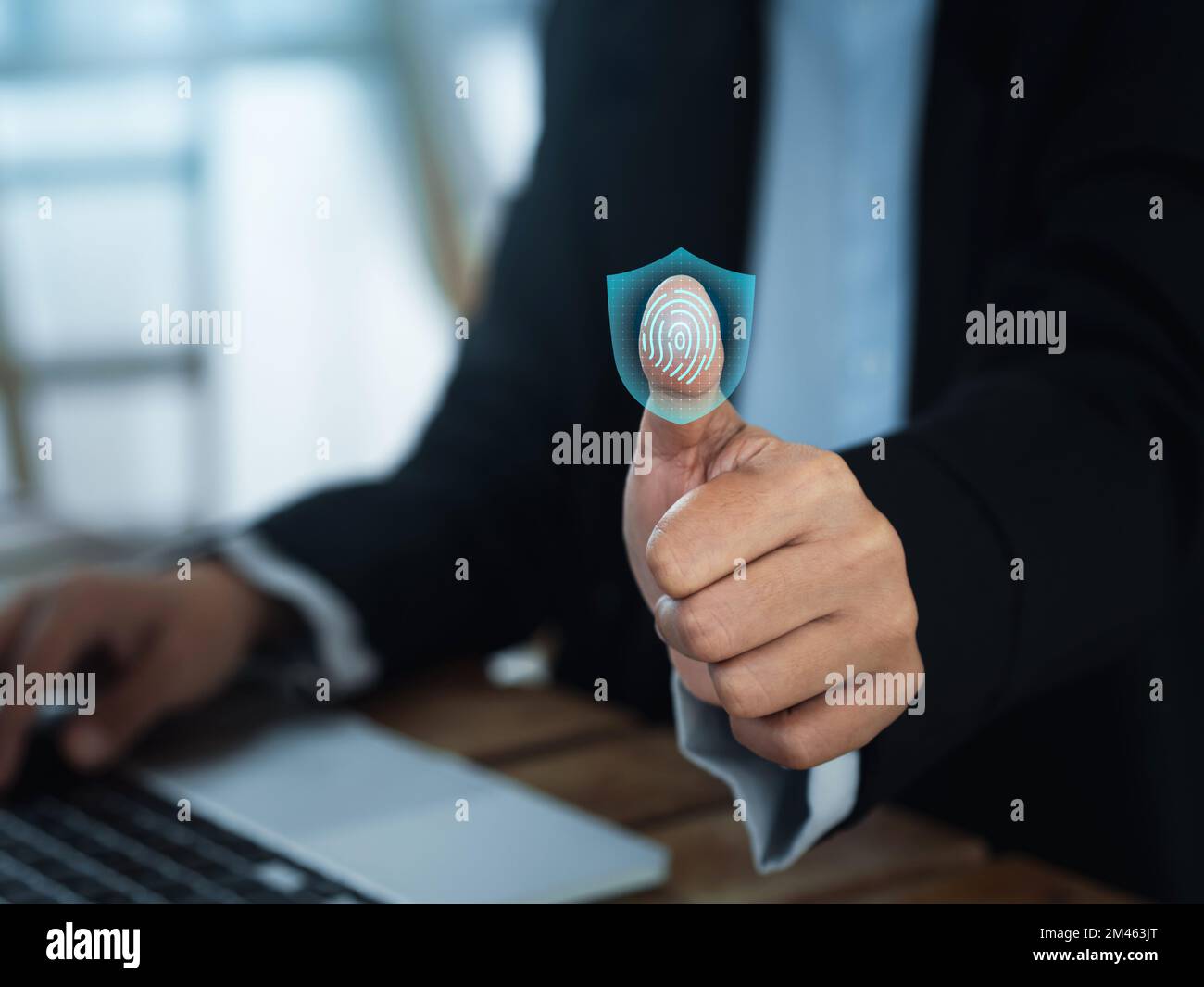 Fingerprint scan with digital safety shield icon on virtual screen ...