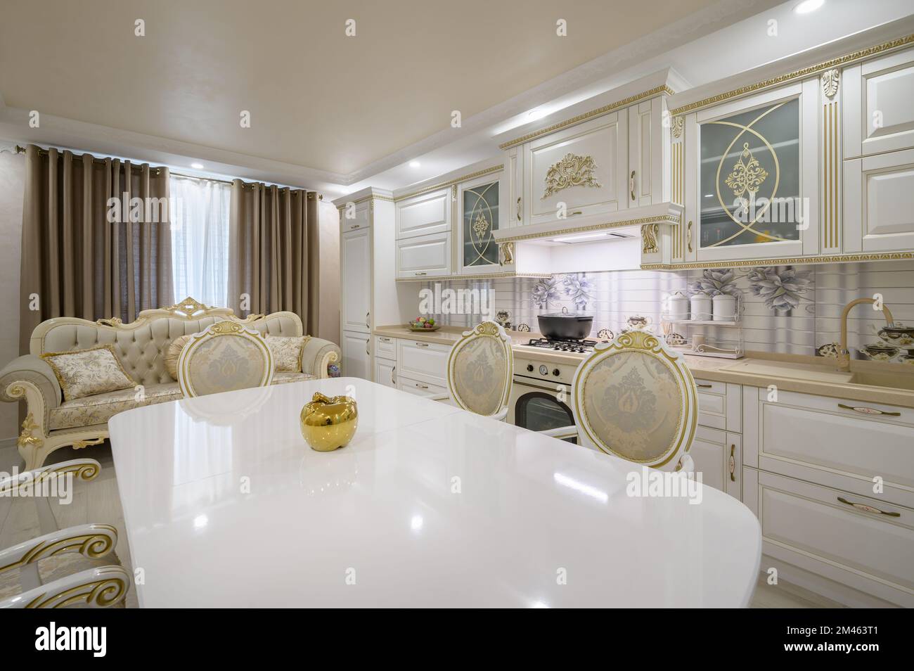 Renovated Interior of rich classic white kitchen Stock Photo - Alamy