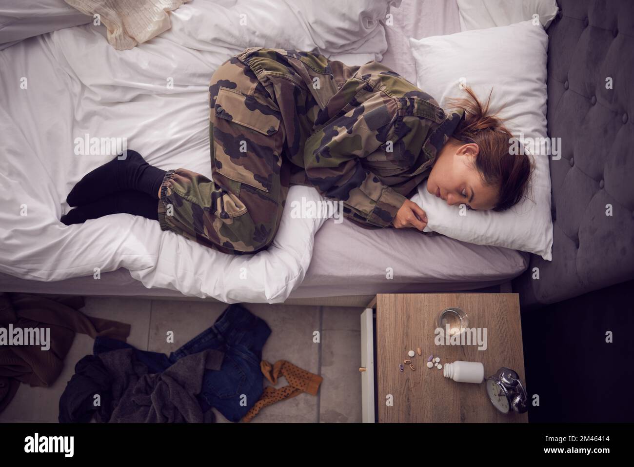 Depression, anxiety and woman soldier in bed with ptsd, trauma and ...