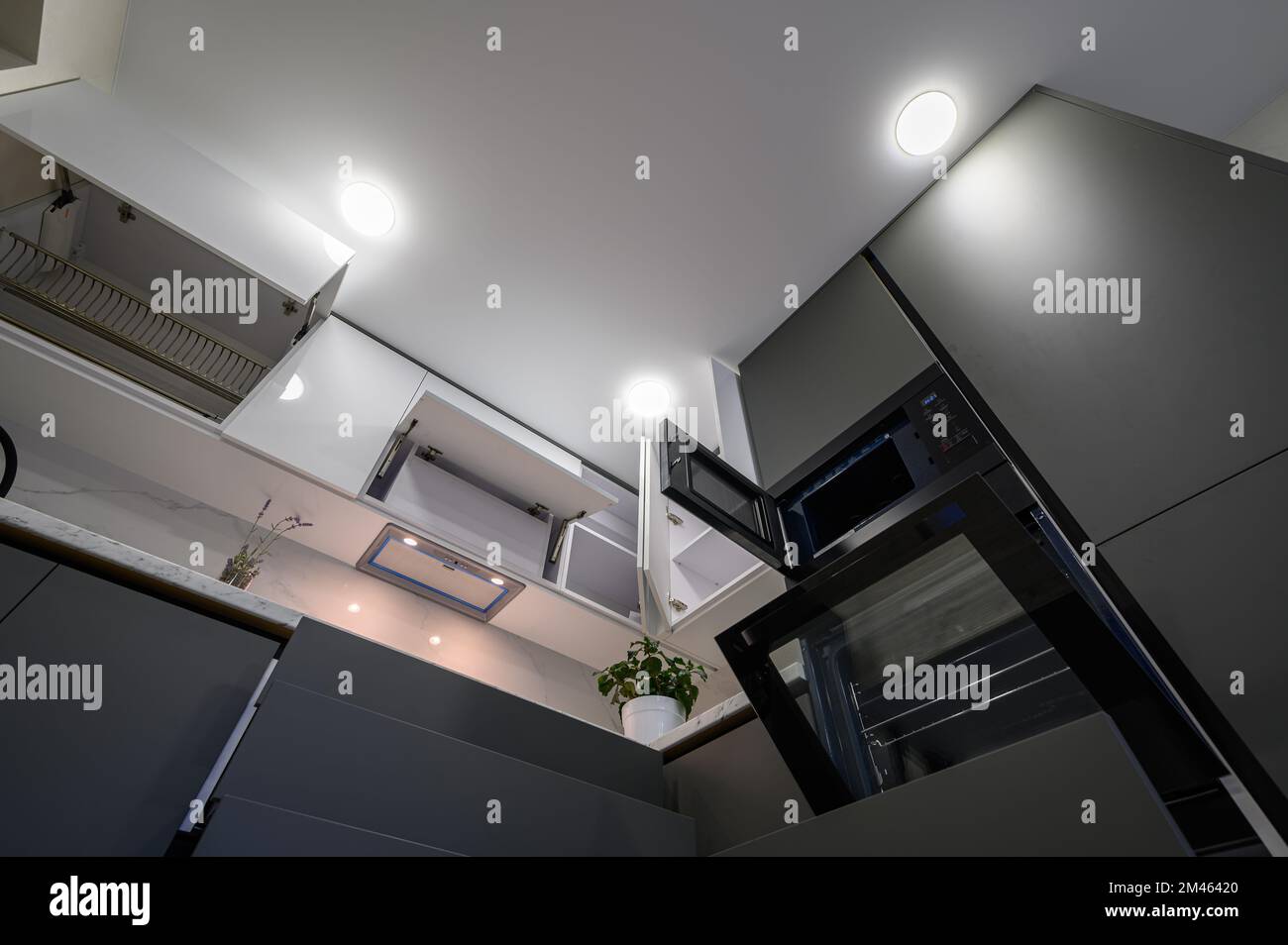 Modern simple trendy dark grey and white kitchen Stock Photo - Alamy