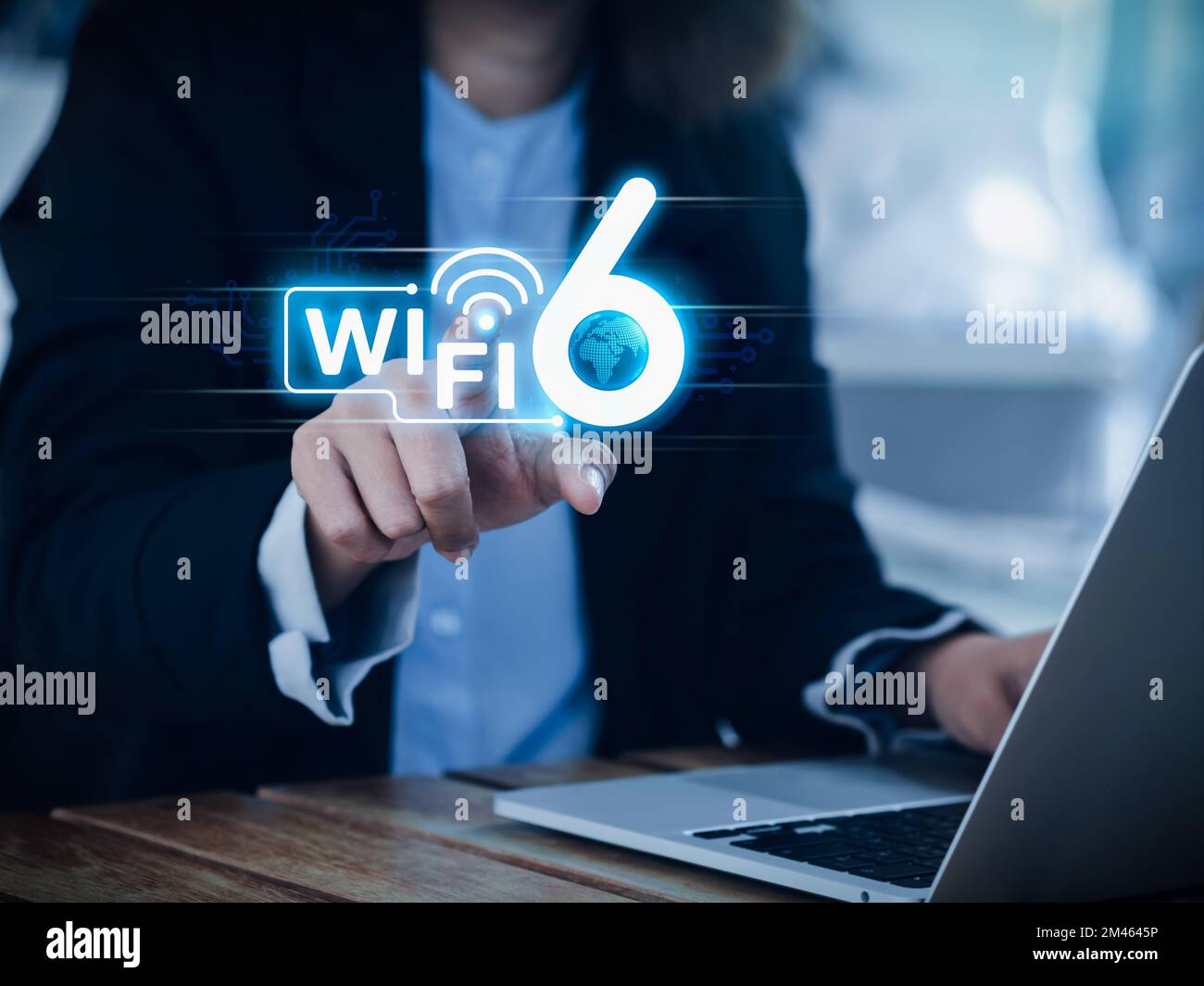 Wi-Fi 6 speed logo glowing on virtual screen while businesswoman ...