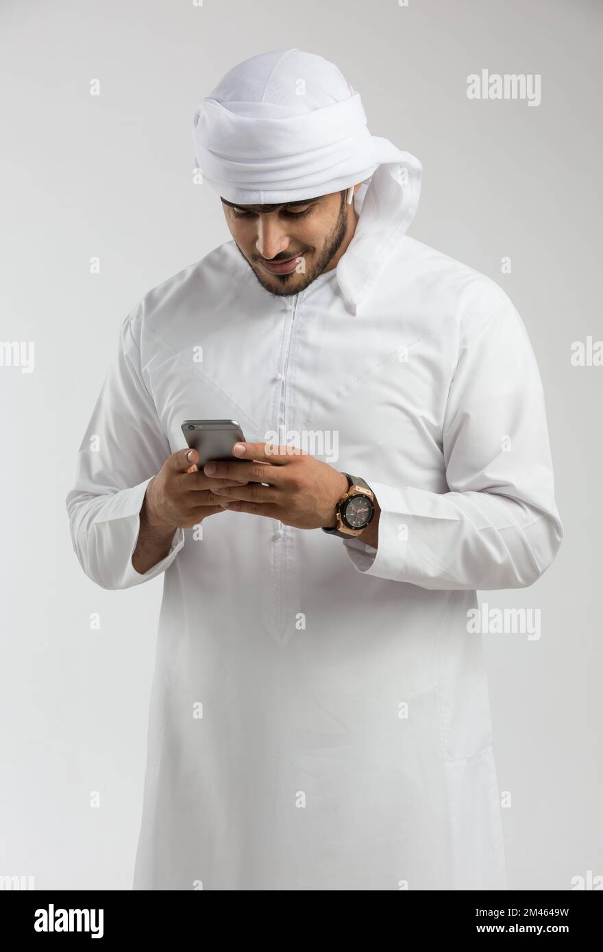 Emirati man headphones hi-res stock photography and images - Alamy