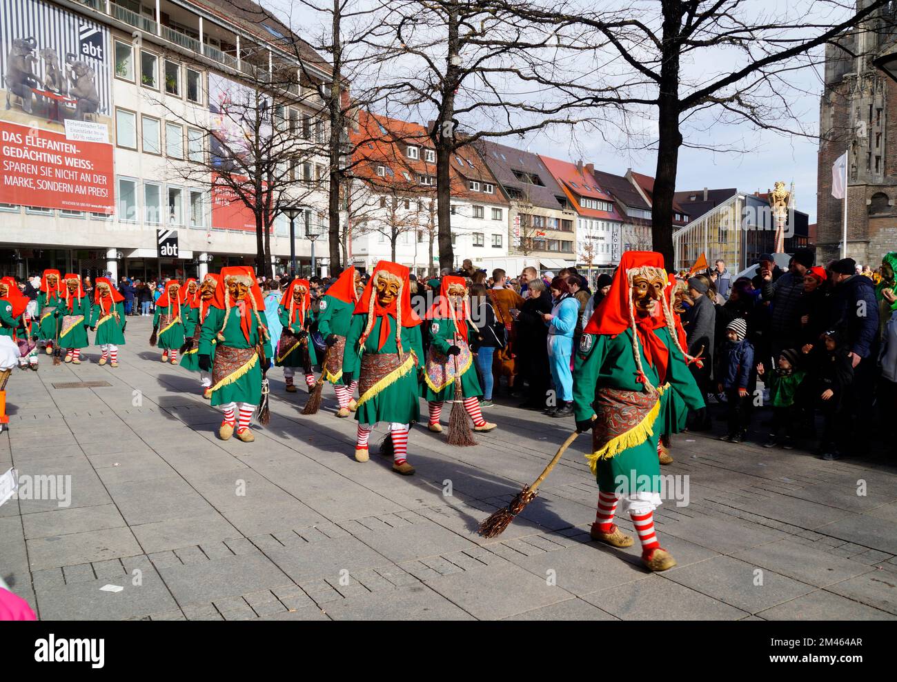 people dressed up in funny clothes and masks celebrating traditional ...