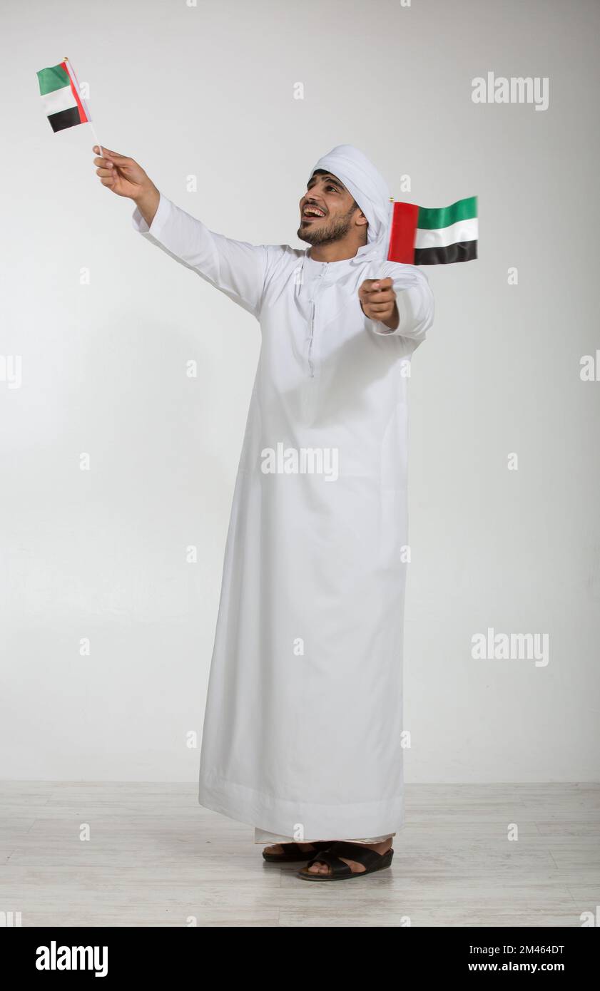 Young arab man holding hi-res stock photography and images - Alamy