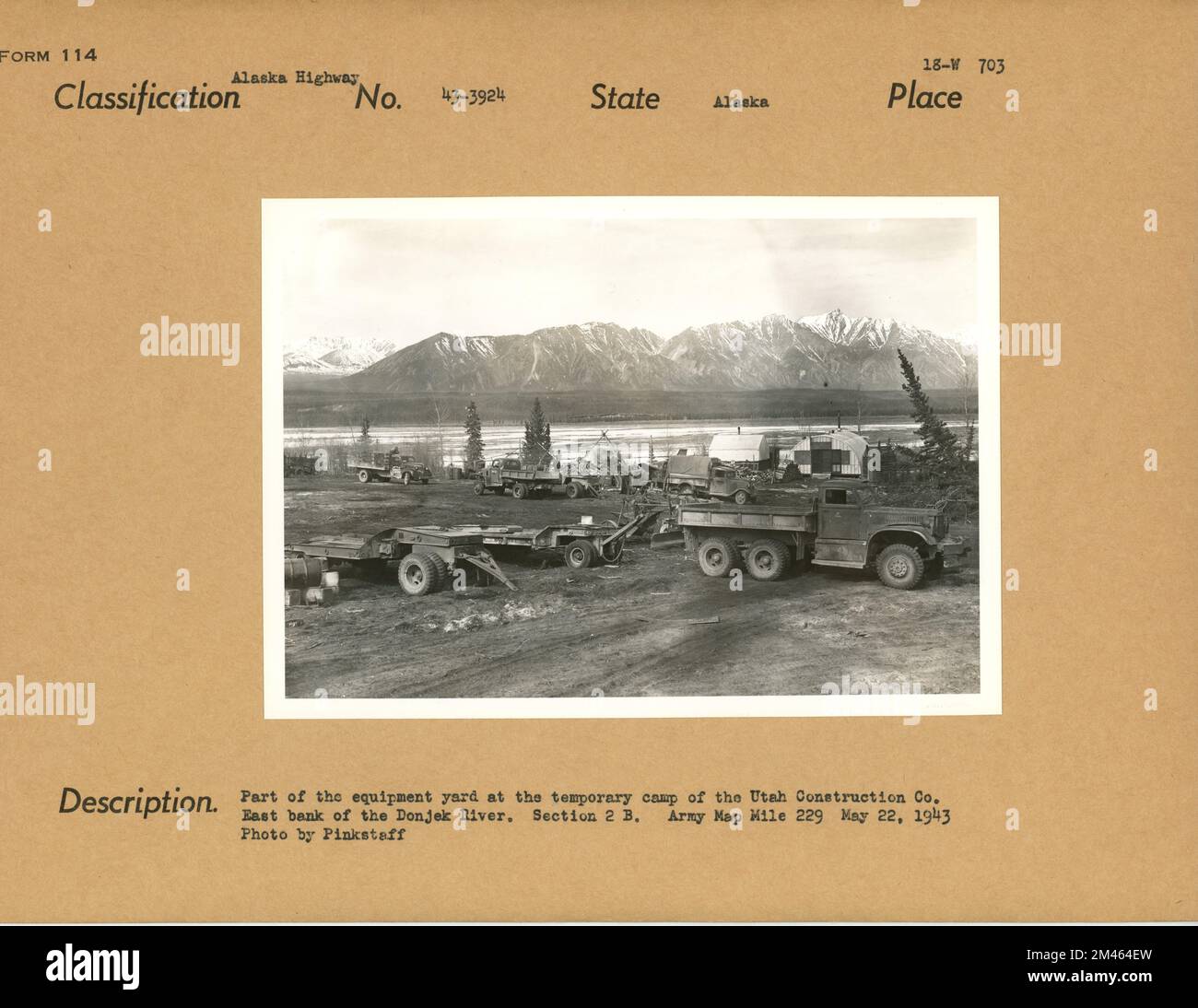 Equipment yard at temporary camp. Original caption: Part of the ...