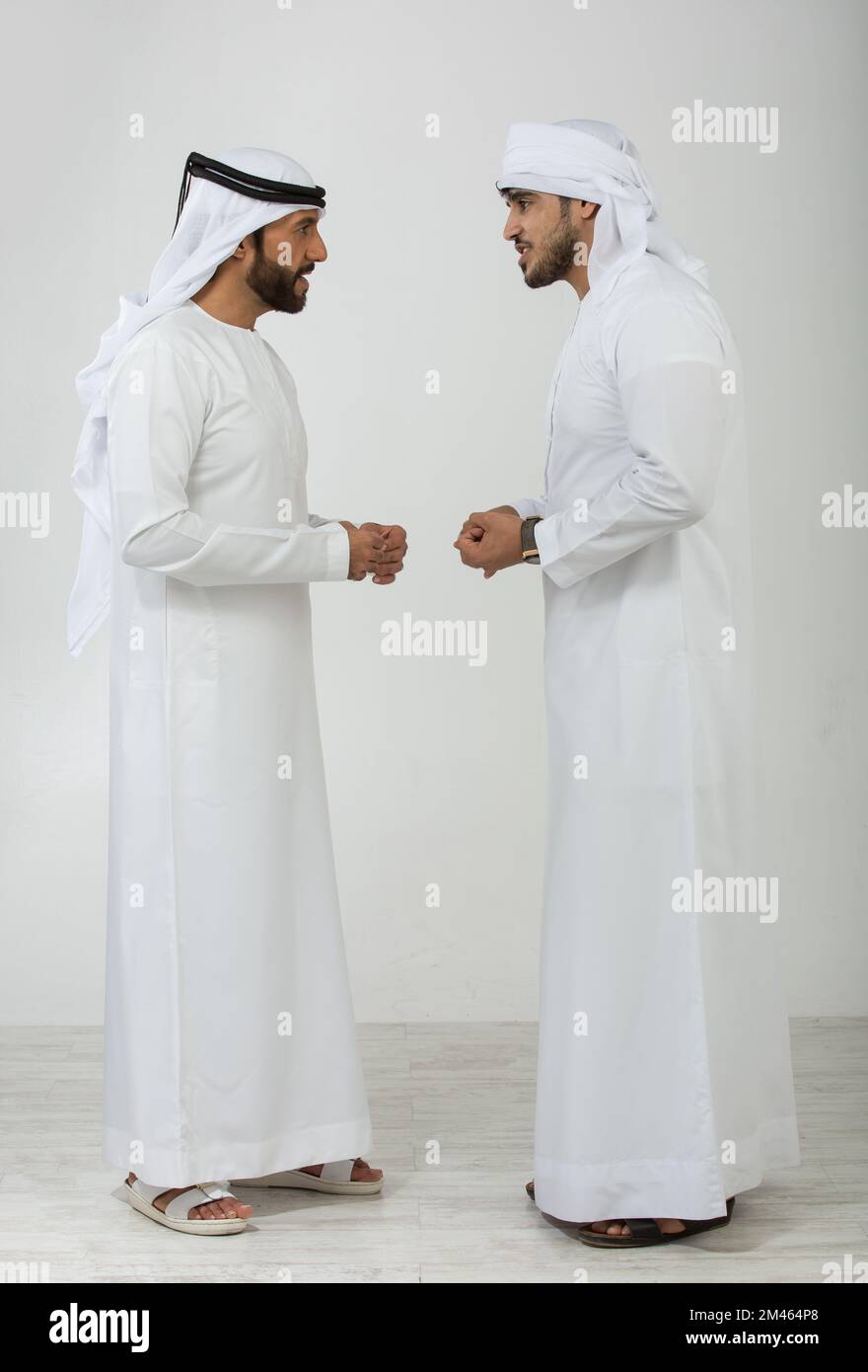 Emirati men talking Stock Photo - Alamy