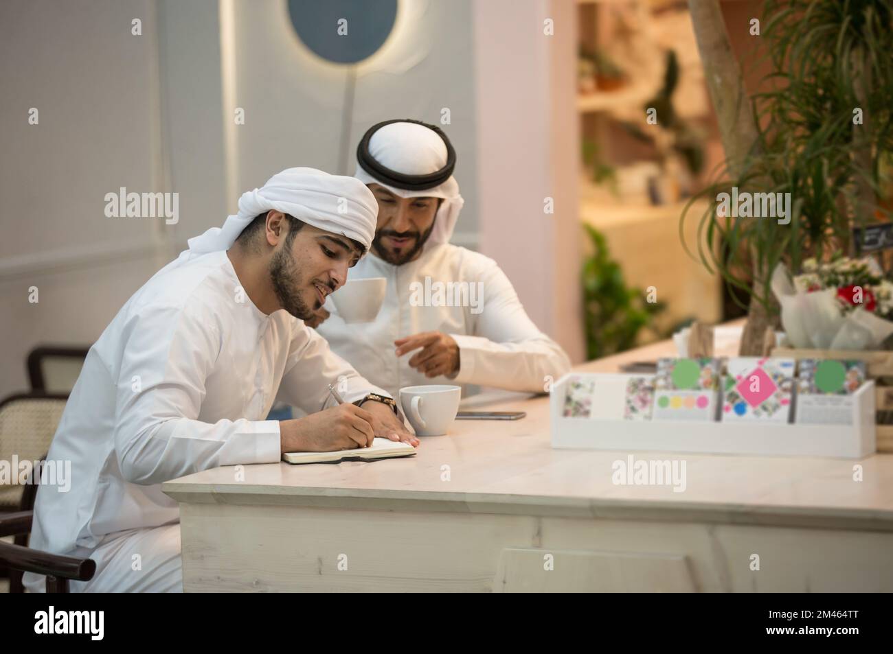 Relaxed arab man sitting hi-res stock photography and images - Alamy