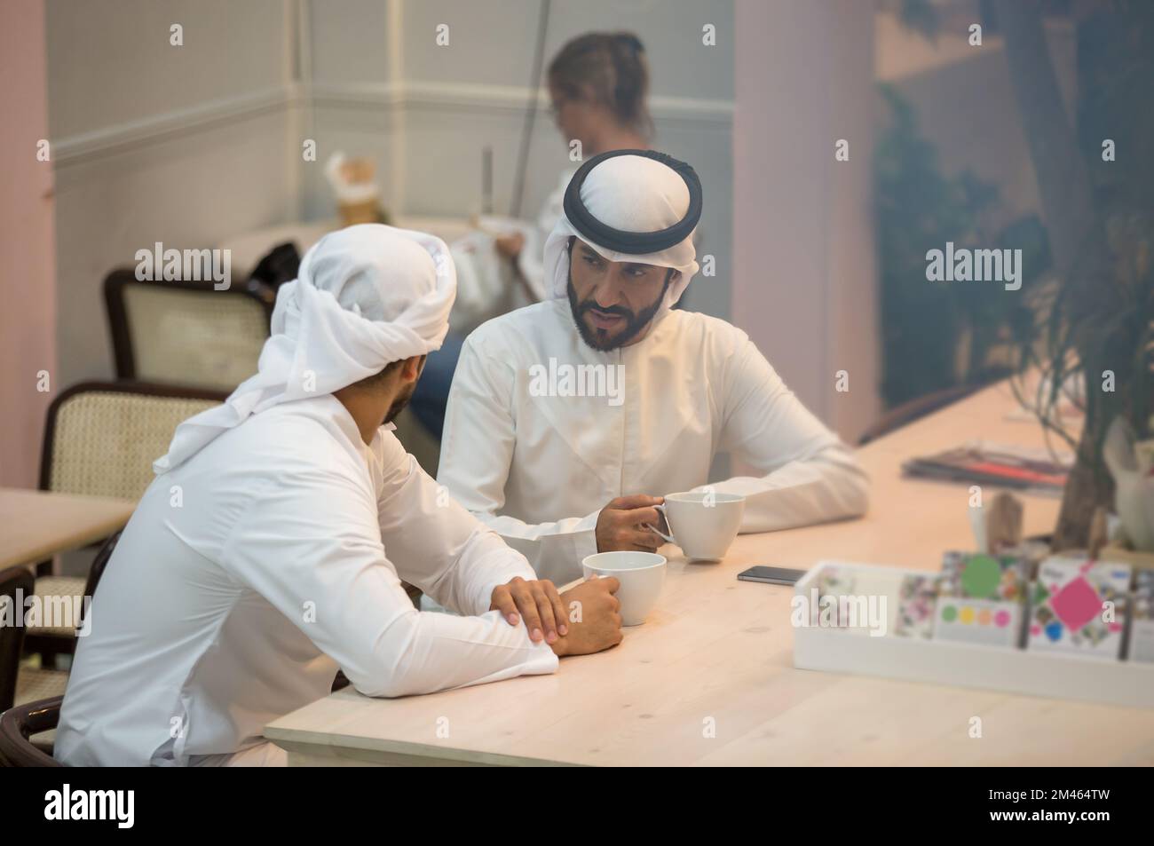 Relaxed arab man sitting hi-res stock photography and images - Alamy
