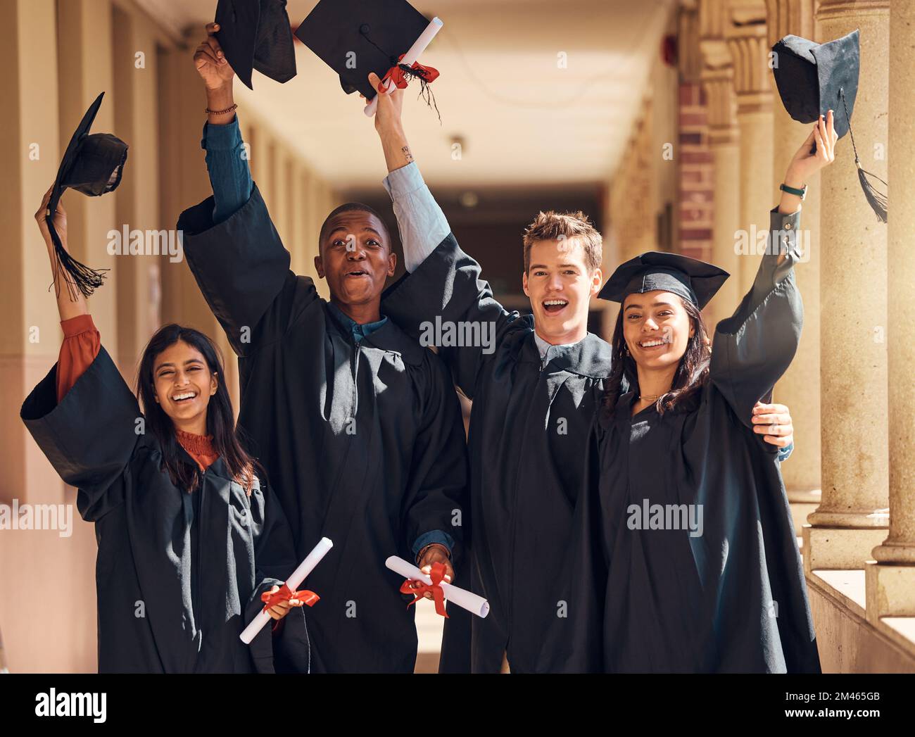 Success, graduation and celebration of students in university in campus ...