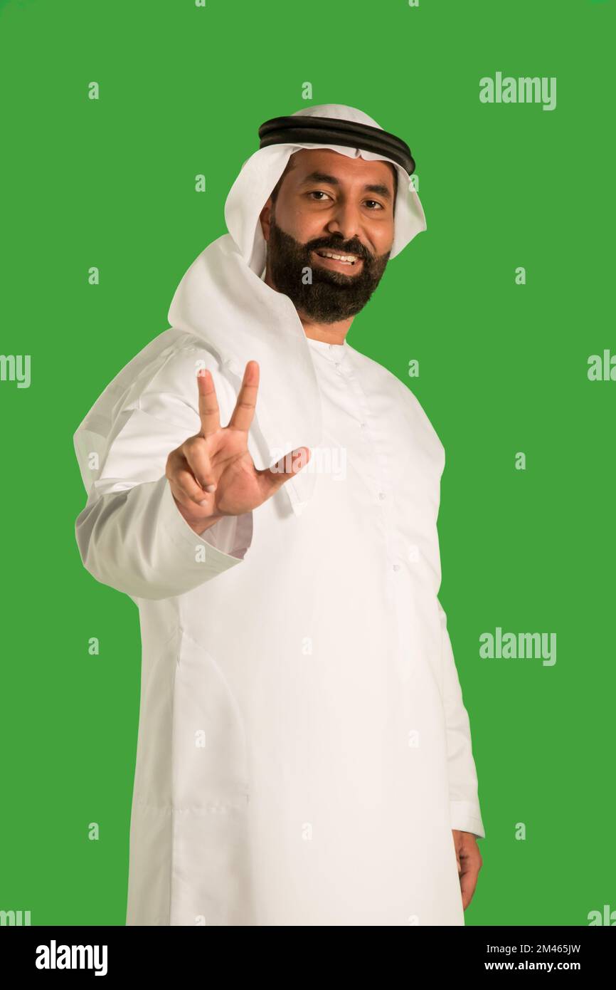 Arab man making sign Stock Photo - Alamy