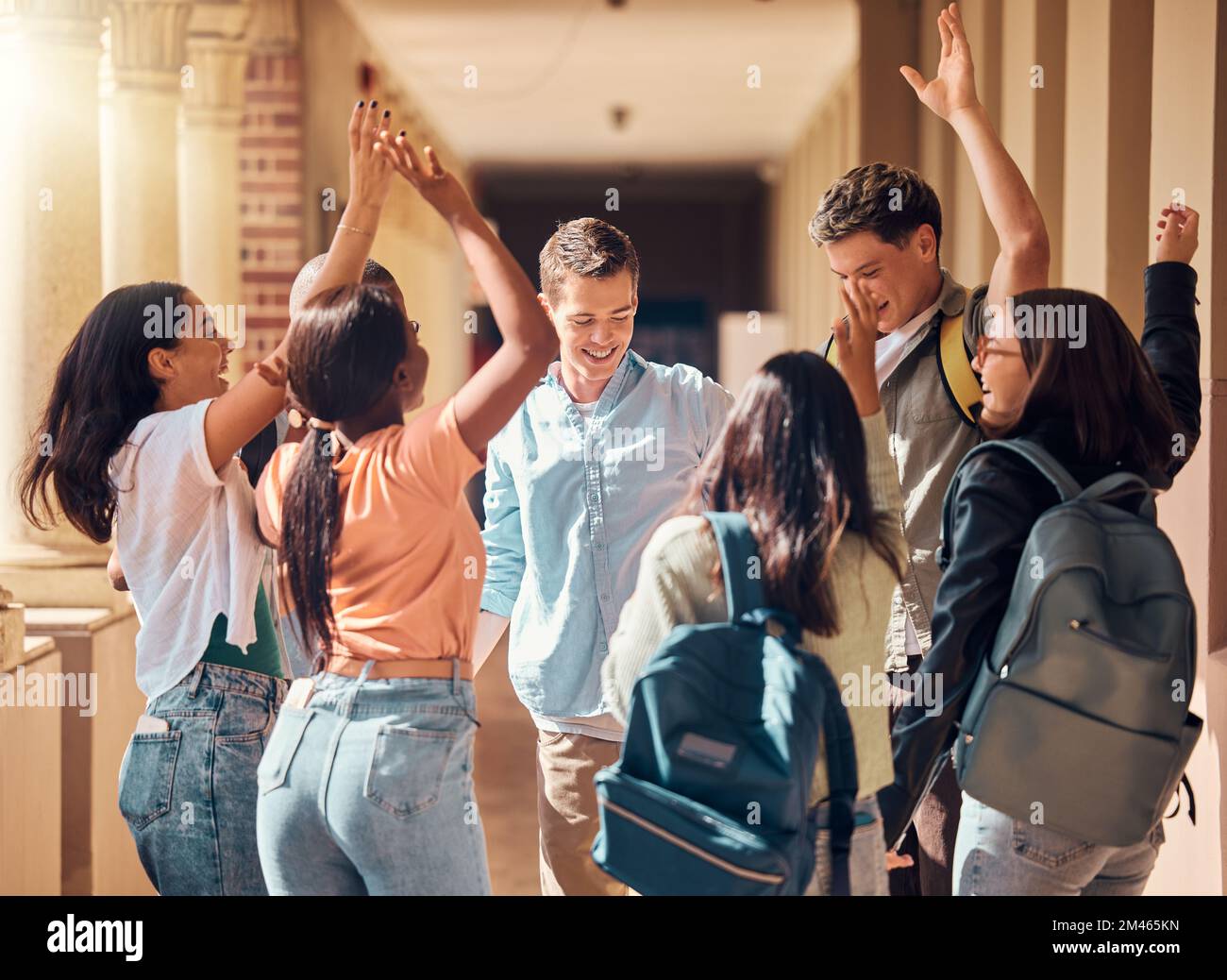 Students, happy and dancing to celebrate on campus together for project ...