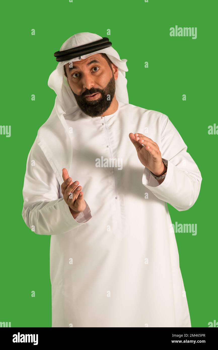 Arab man holding object Stock Photo - Alamy