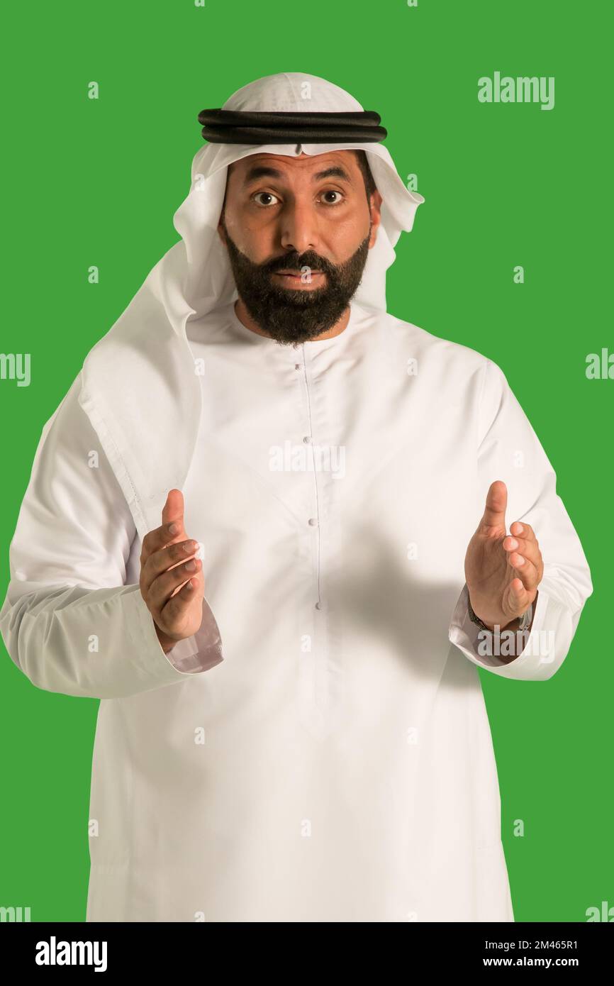 Arab man holding object Stock Photo - Alamy