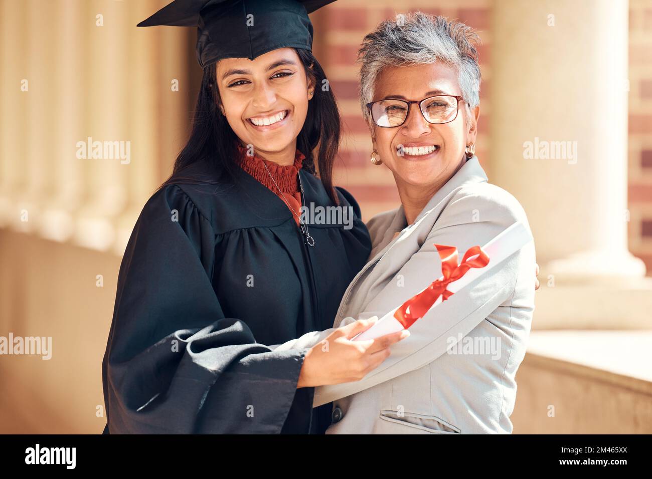 Graduation, student and happy mother portrait of women from India at a ...