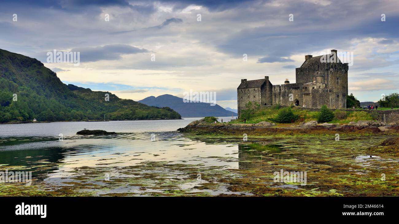 Dark clouds over iconic Eilean Donan Castle, Scottish Highlands Stock ...