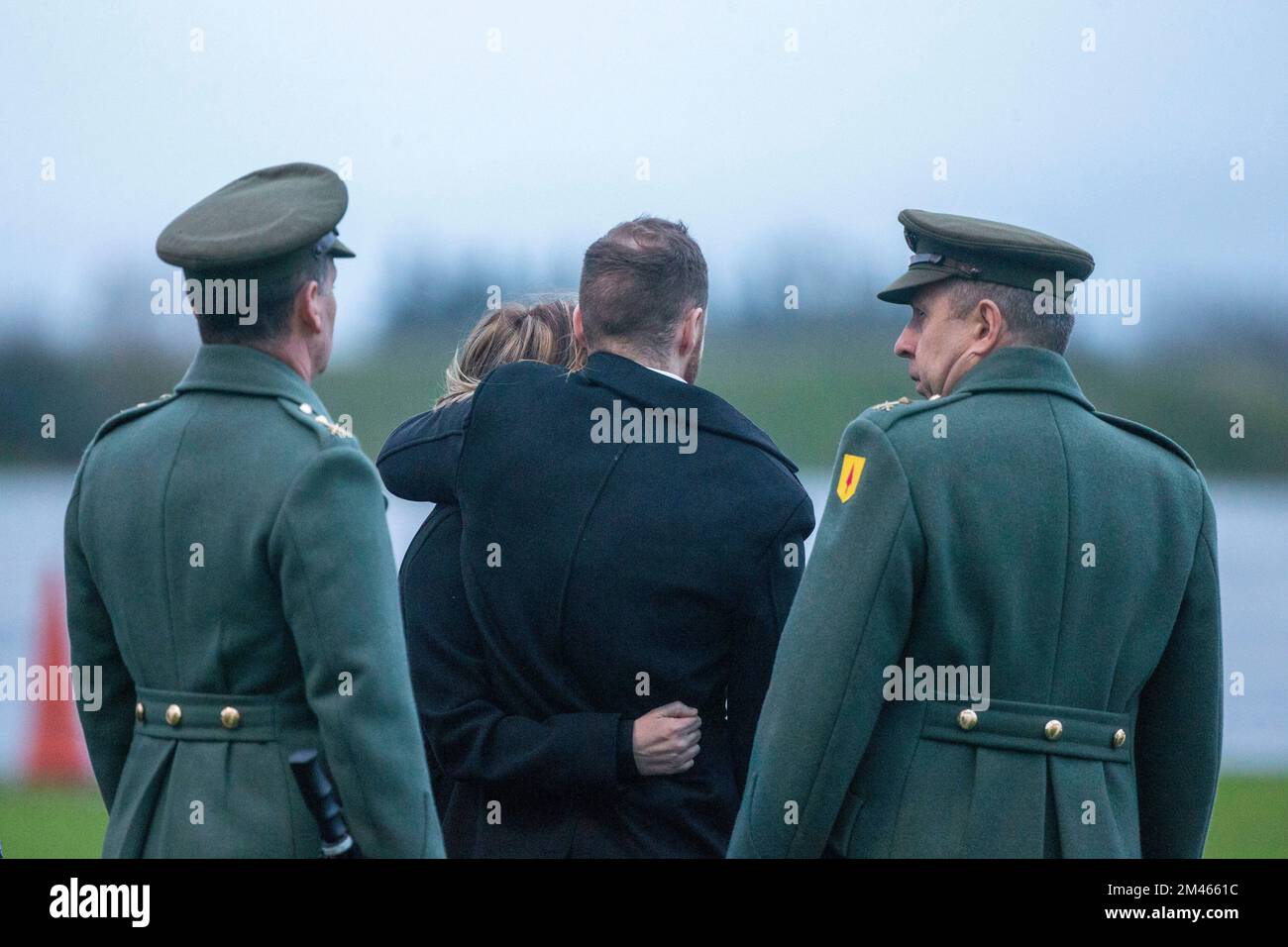 Family members wait for the arrival of the body of Irish UN ...