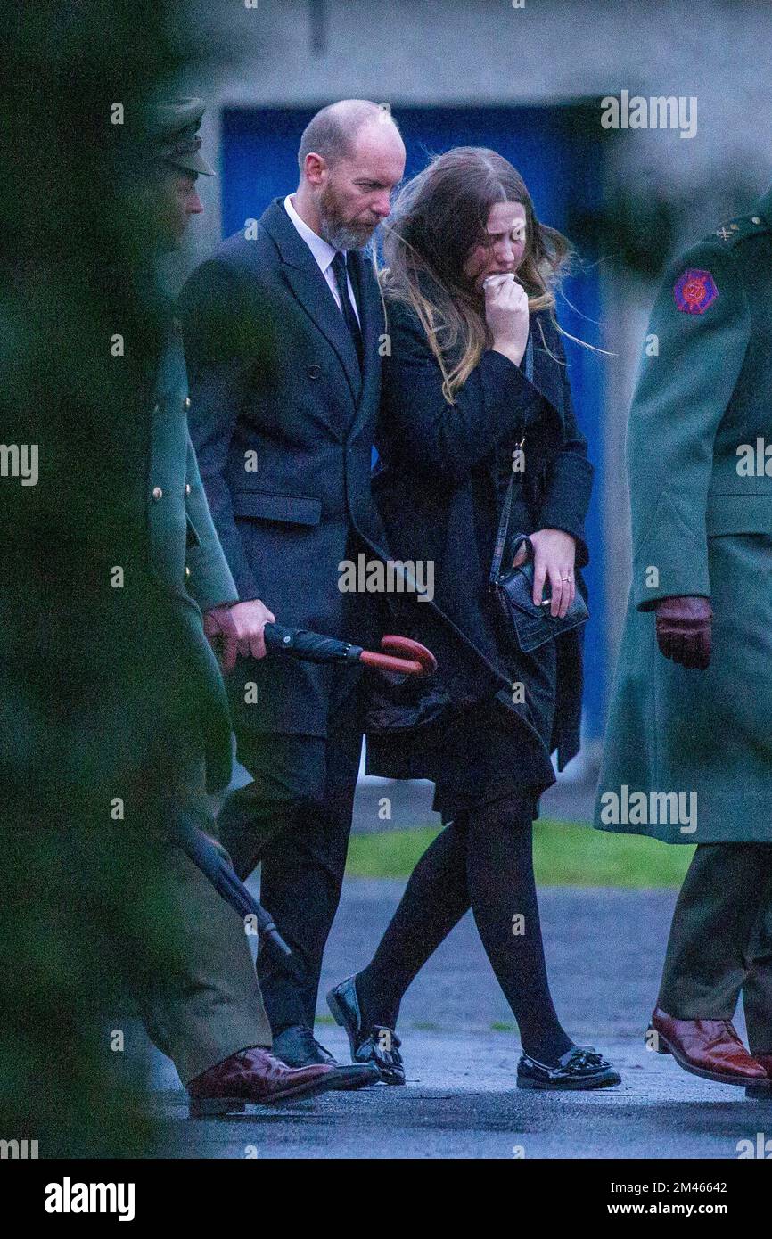 Family members wait for the arrival of the body of Irish UN ...