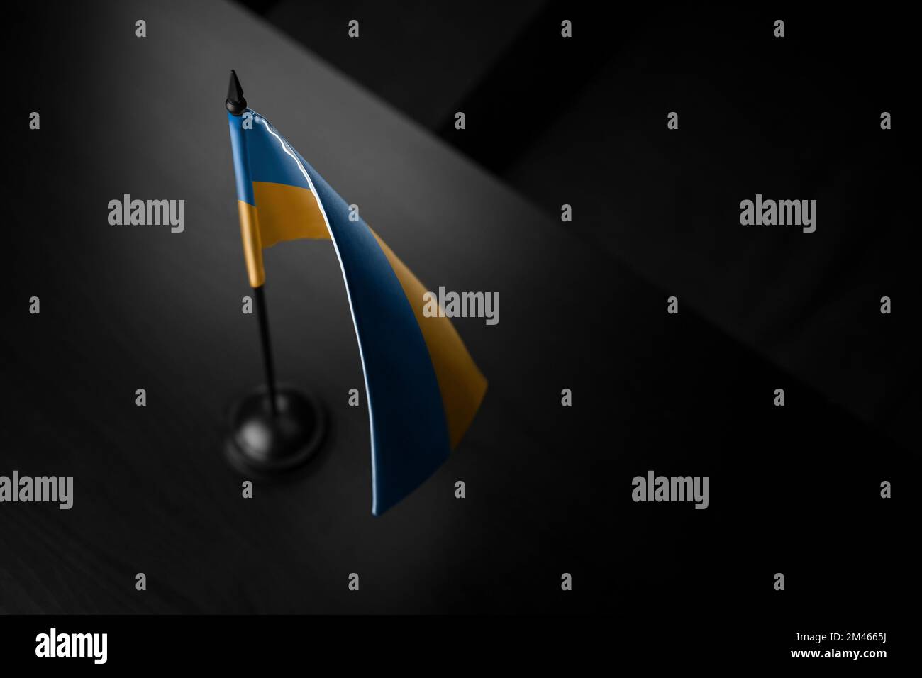 Small national flag of the Ukraine on a black background Stock Photo ...