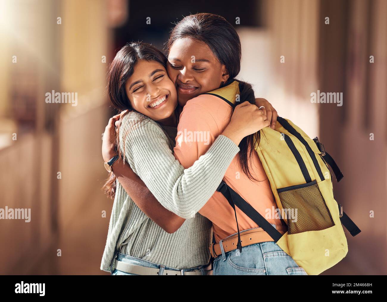 Education, friends and hug with women in college for learning, scholarship and happiness ...