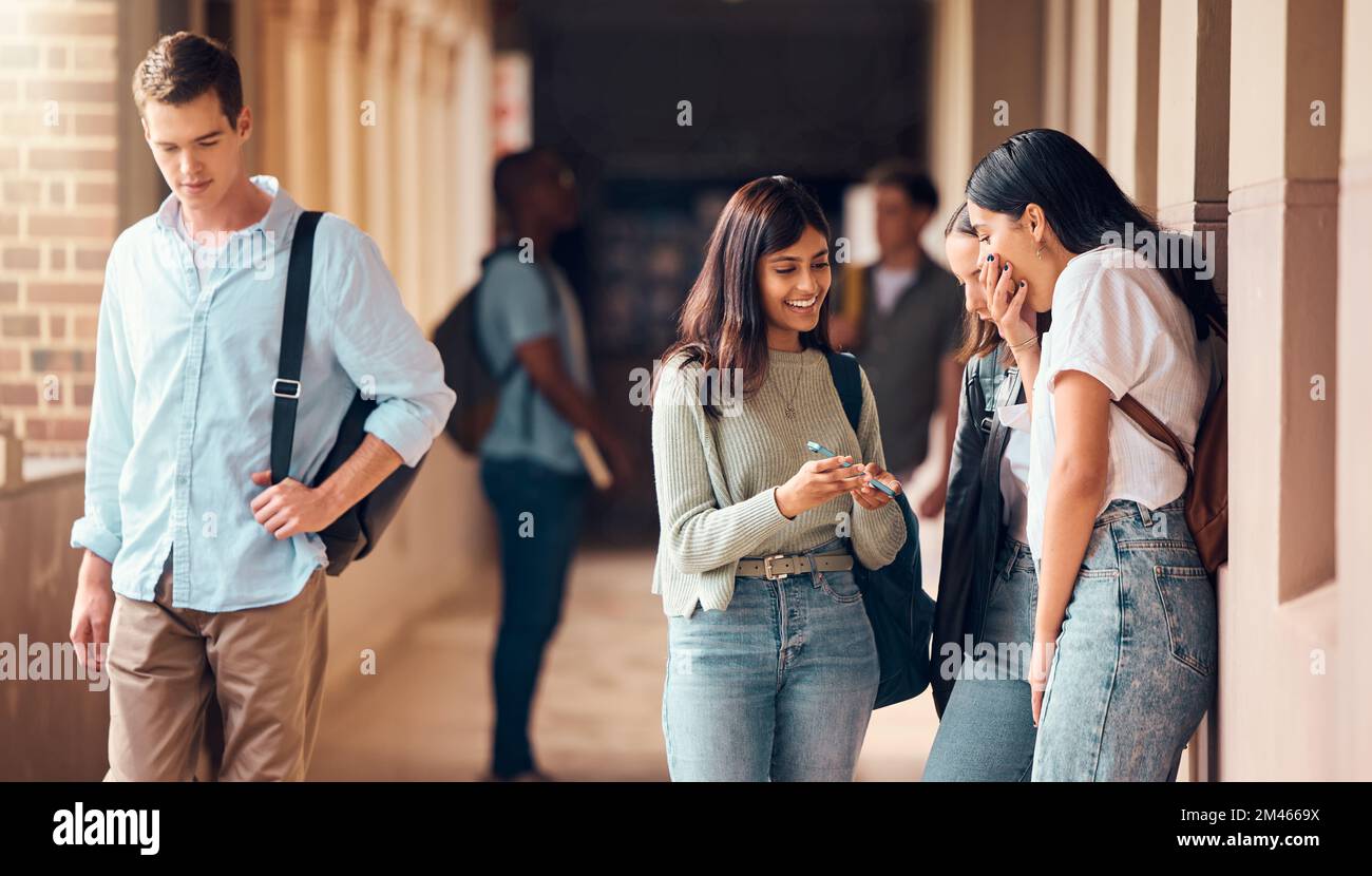 University, hallway and group of students with phone laughing at social ...
