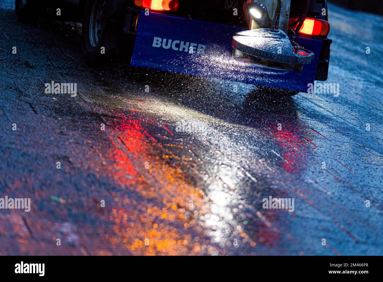 Hanover, Germany. 19th Dec, 2022. A gritting vehicle spreads grit on ...