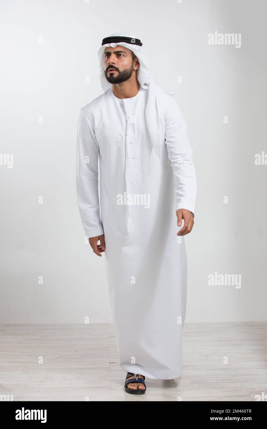 Arab man walking Stock Photo - Alamy