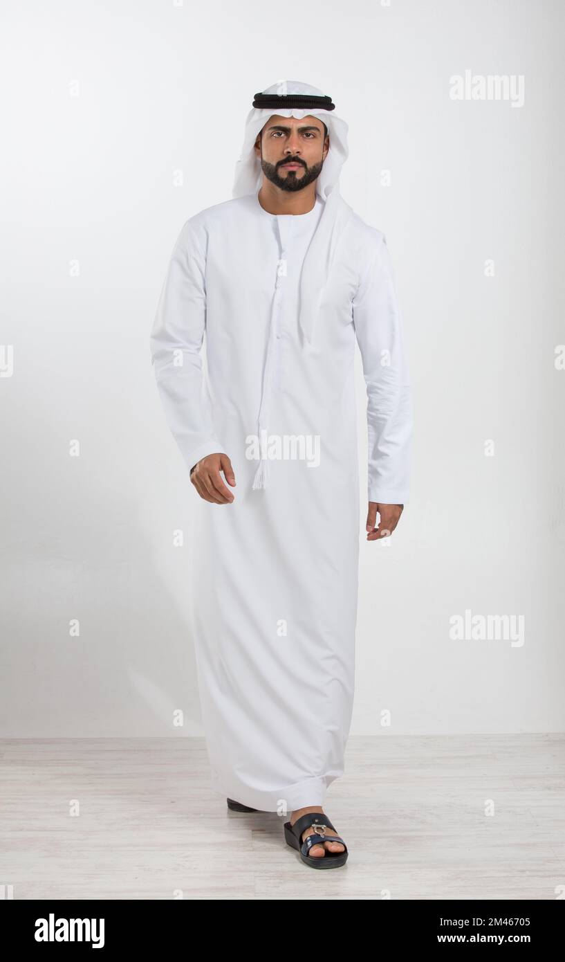 Arab man walking Stock Photo - Alamy