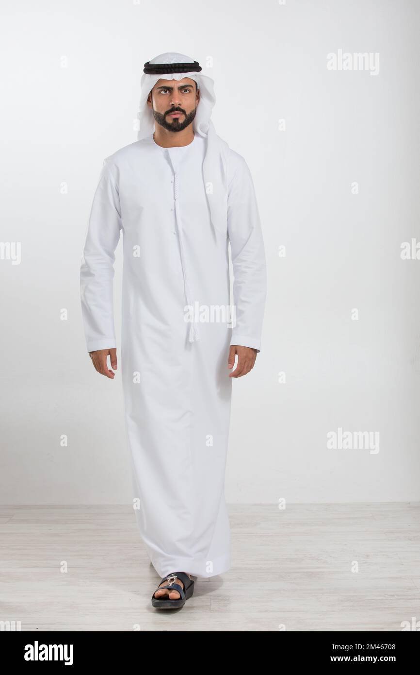 Arab man walking Stock Photo - Alamy
