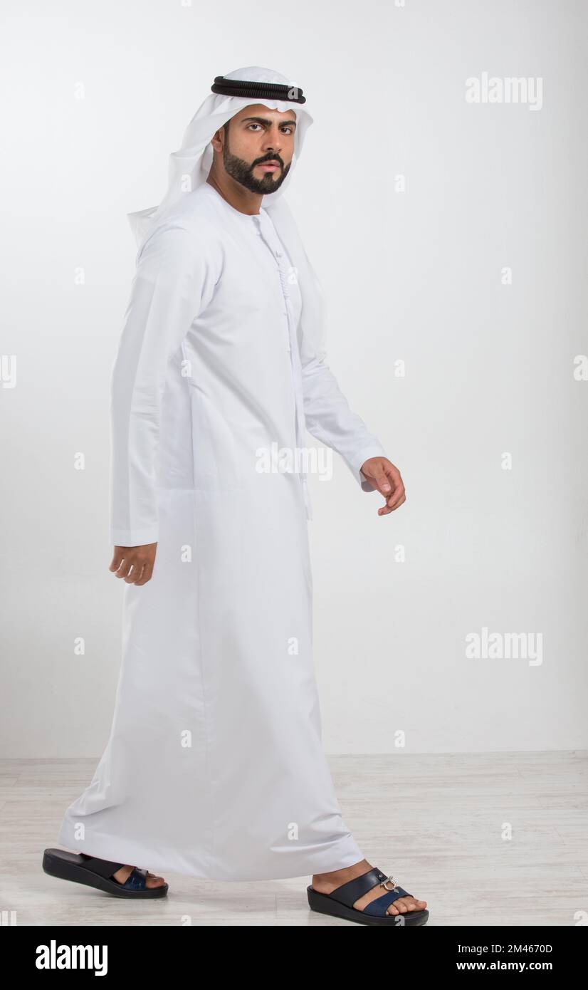 Arab man walking Stock Photo - Alamy