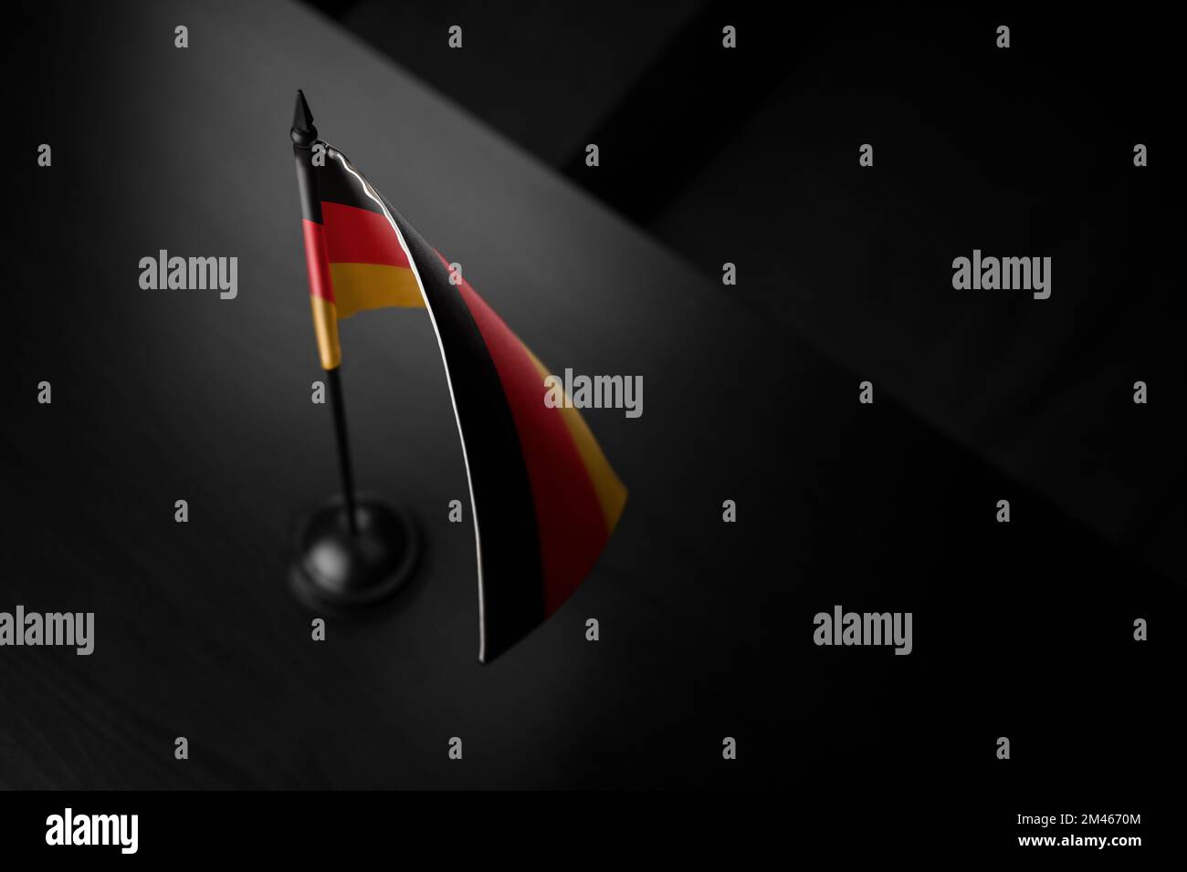 Small national flag of the Germany on a black background Stock Photo ...
