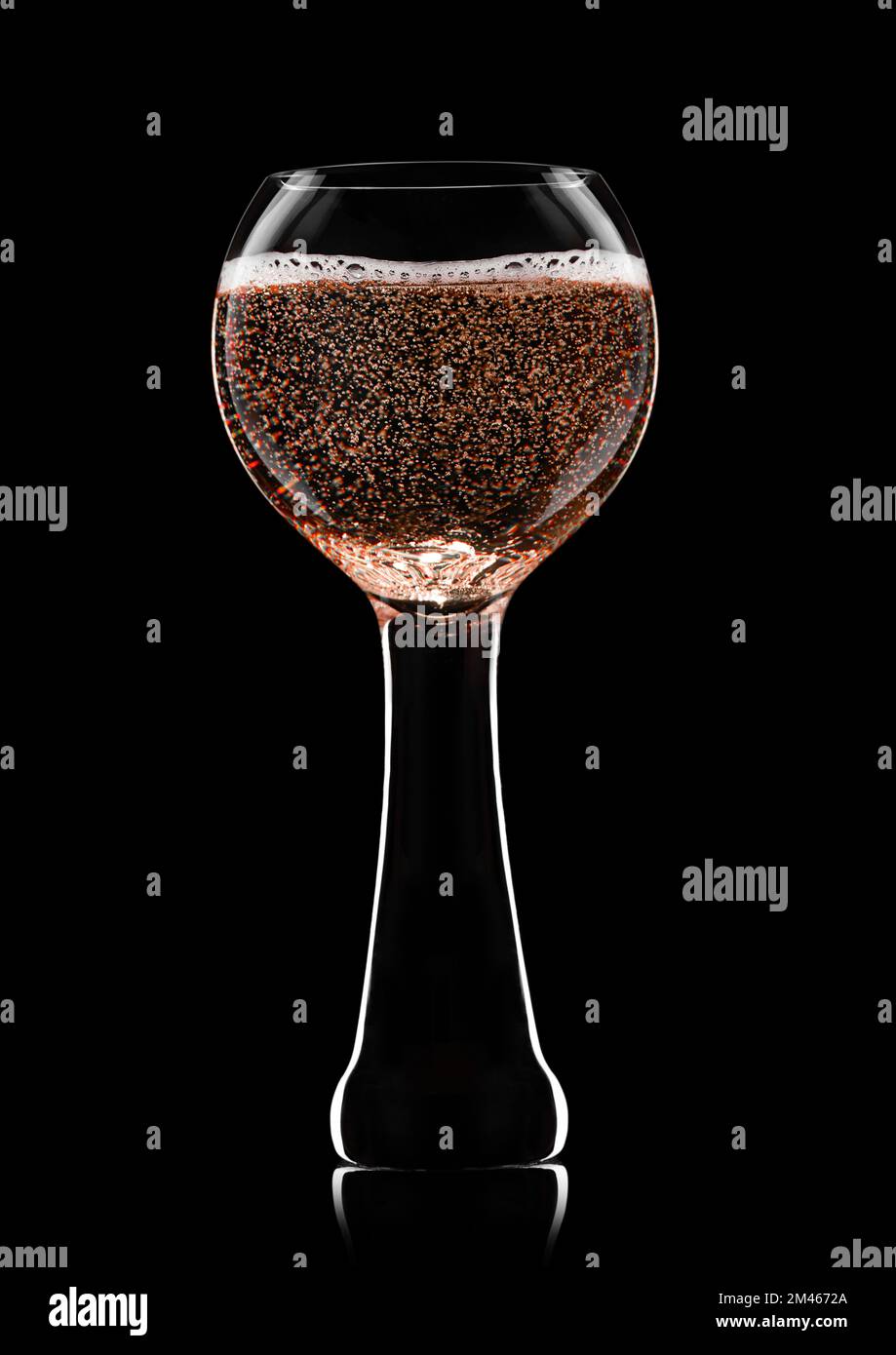 Balloon pink rose champagne glass on black Stock Photo - Alamy