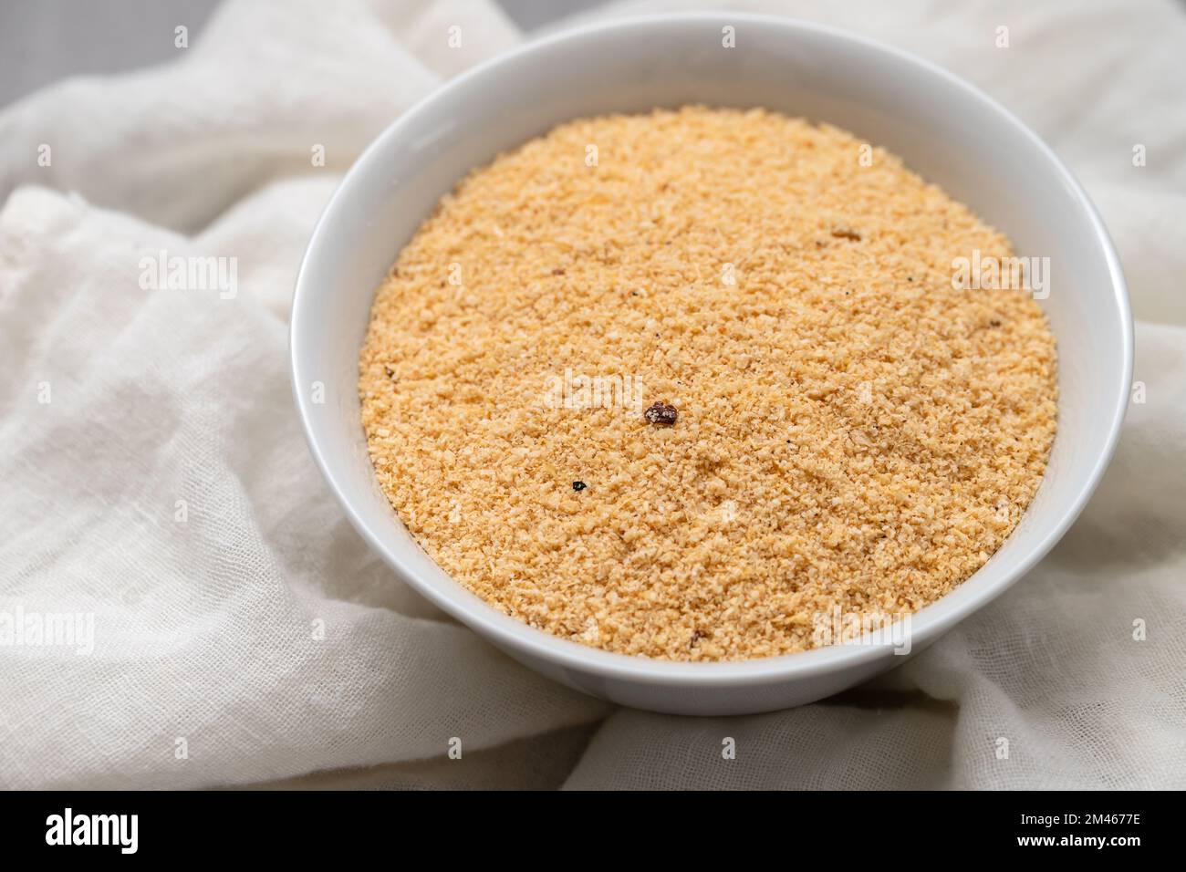 Farofa, typical brazilian manioc flour side dish on gray ceramic Stock ...