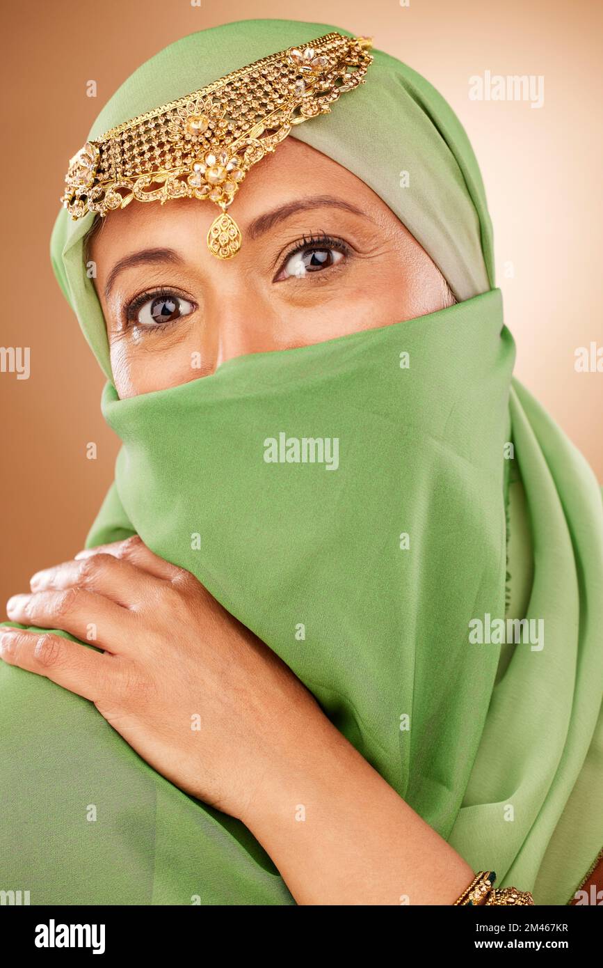 Fashion, tradition and face of a muslim woman in studio with ...