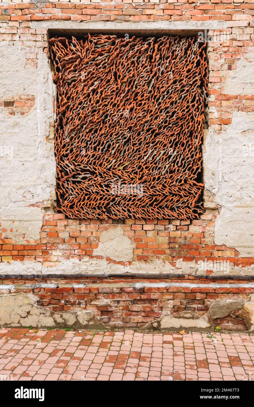 Old window filled with roof tiles as background Stock Photo - Alamy
