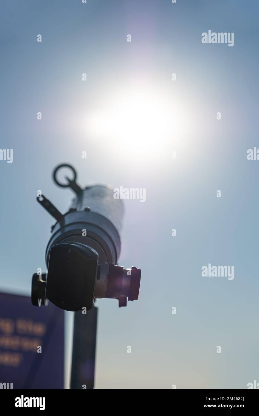 Steel telescope installed on a lookout point. Solar eclipse observation ...