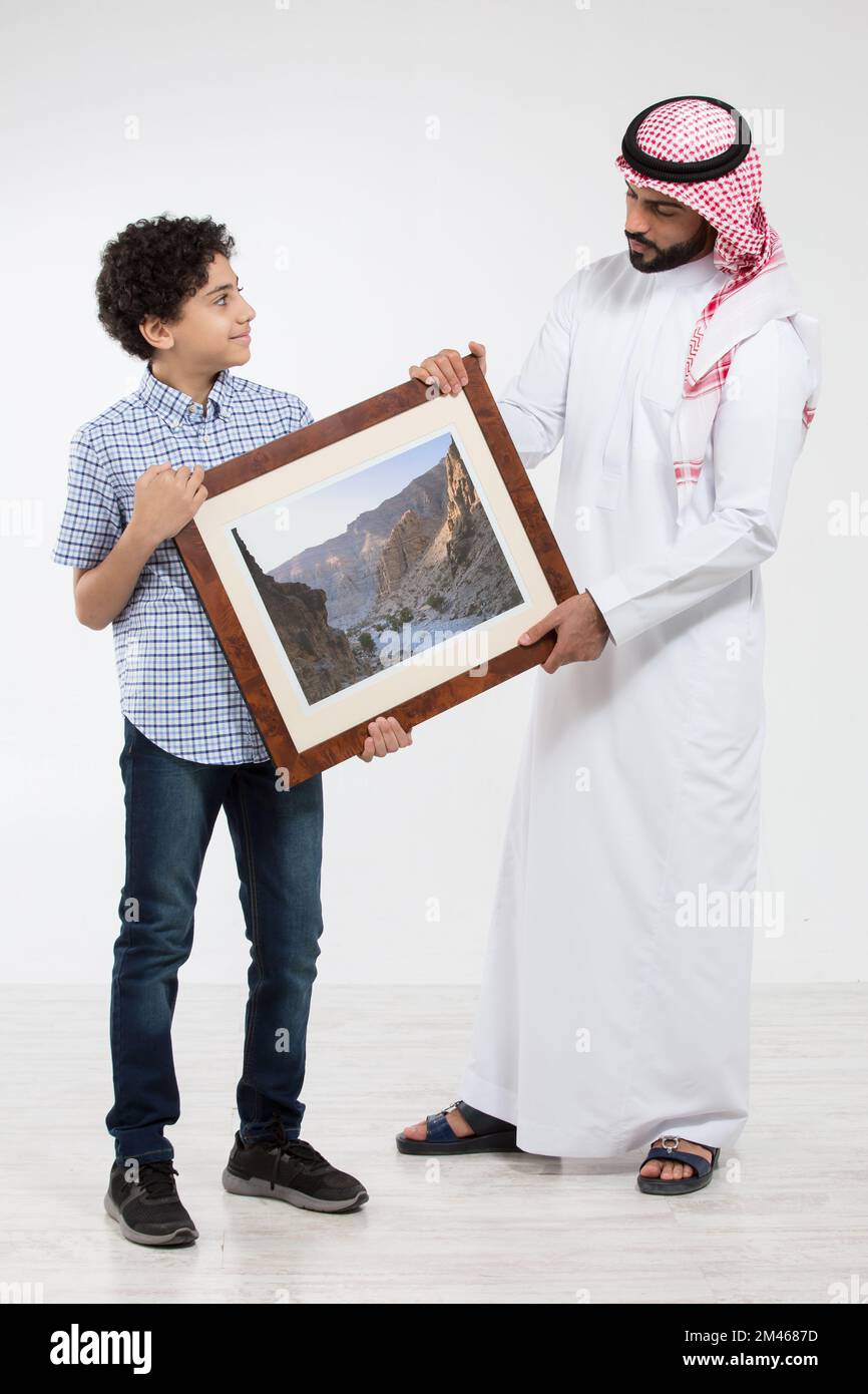 Arab father and son Stock Photo - Alamy