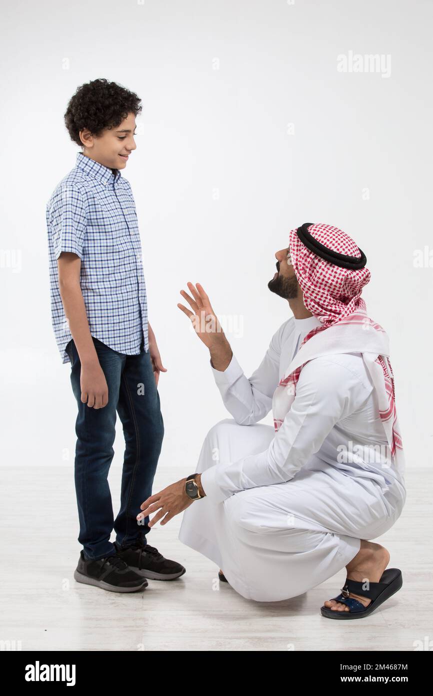 Arab father and son Stock Photo - Alamy