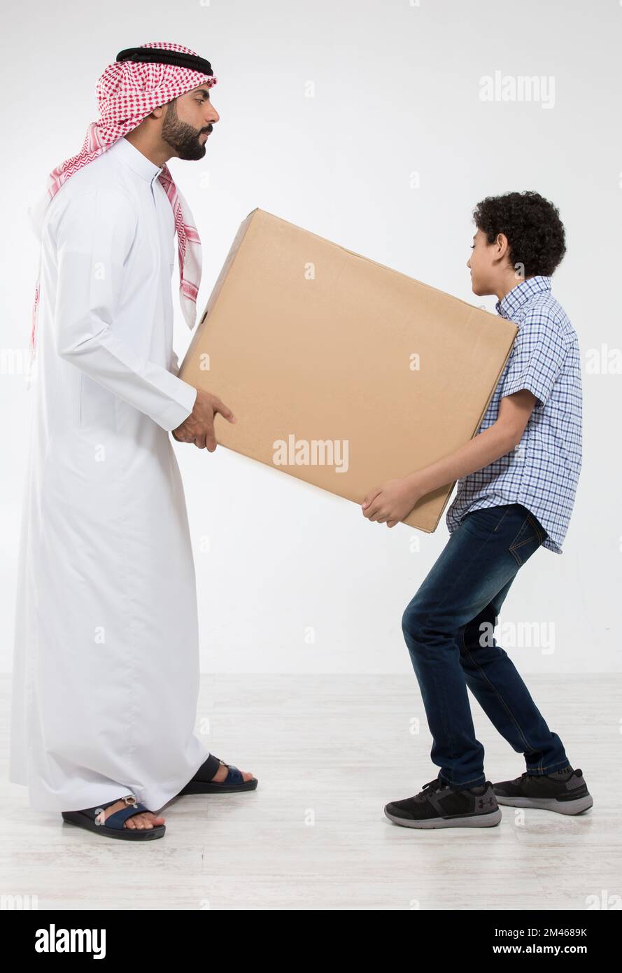 Arab father and son Stock Photo - Alamy