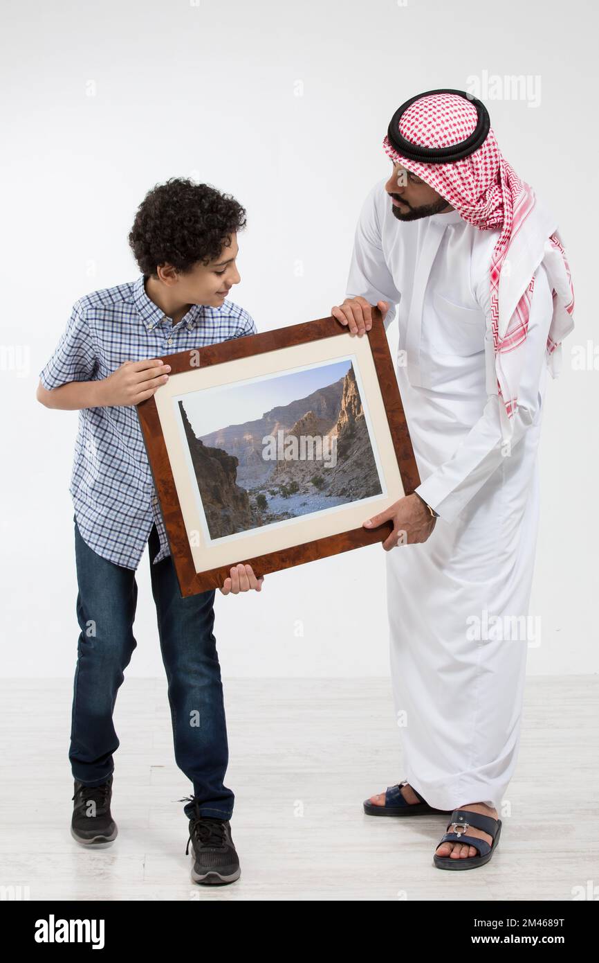 Arab father and son Stock Photo - Alamy