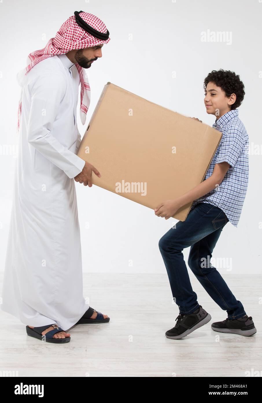 Arab father and son Stock Photo - Alamy