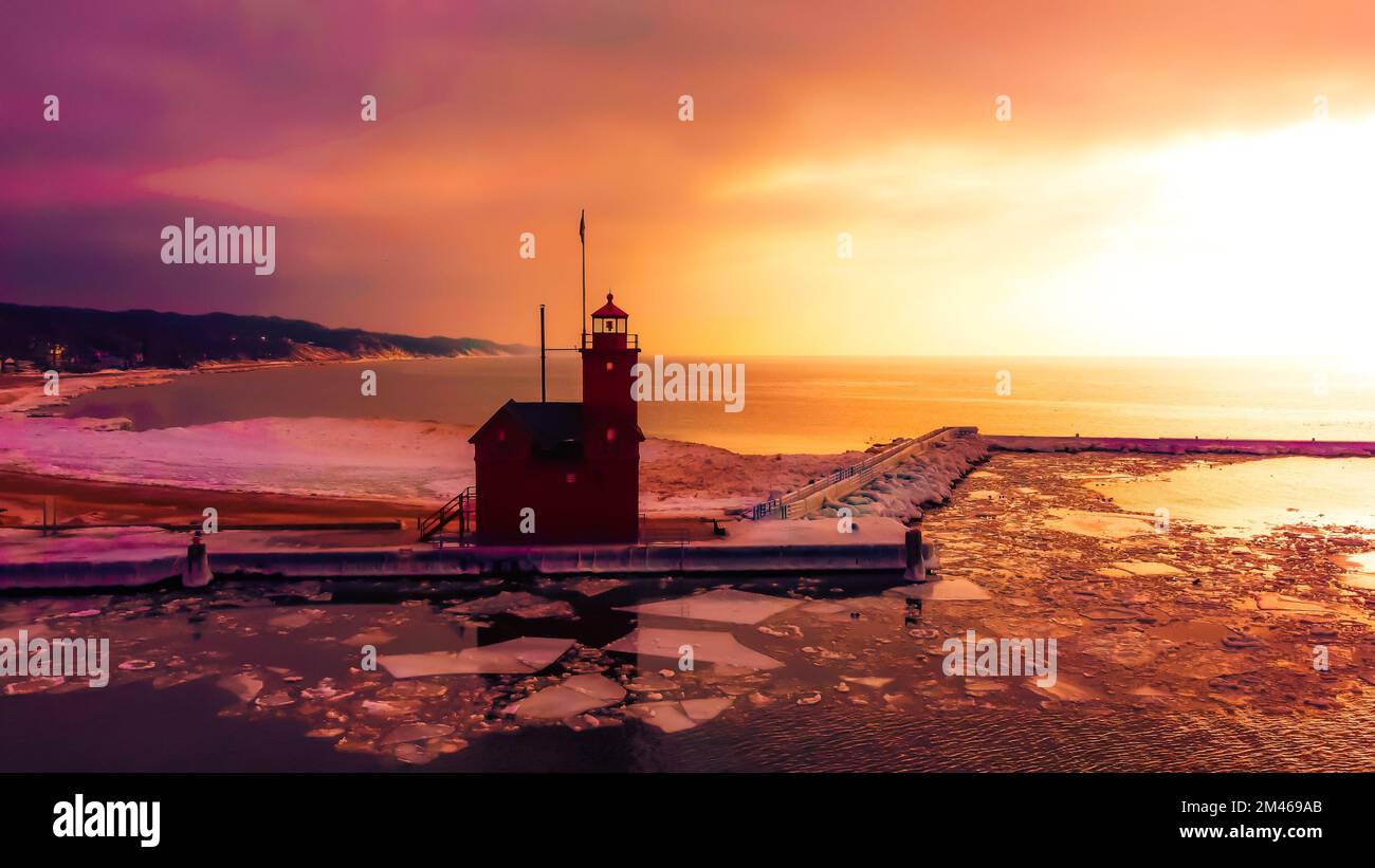 An aerial view of red lighthouse in Michigan during sunset Stock Photo ...