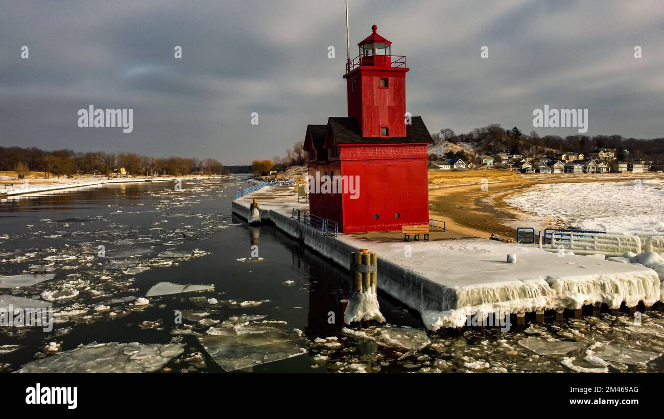 An aerial view of red lighthouse in Michigan during sunset Stock Photo ...