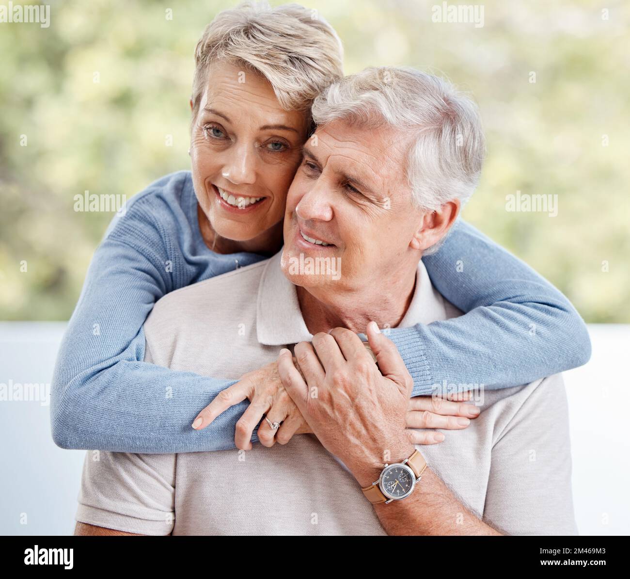 Elderly, couple and love, hug and relax at family home, commitment with ...