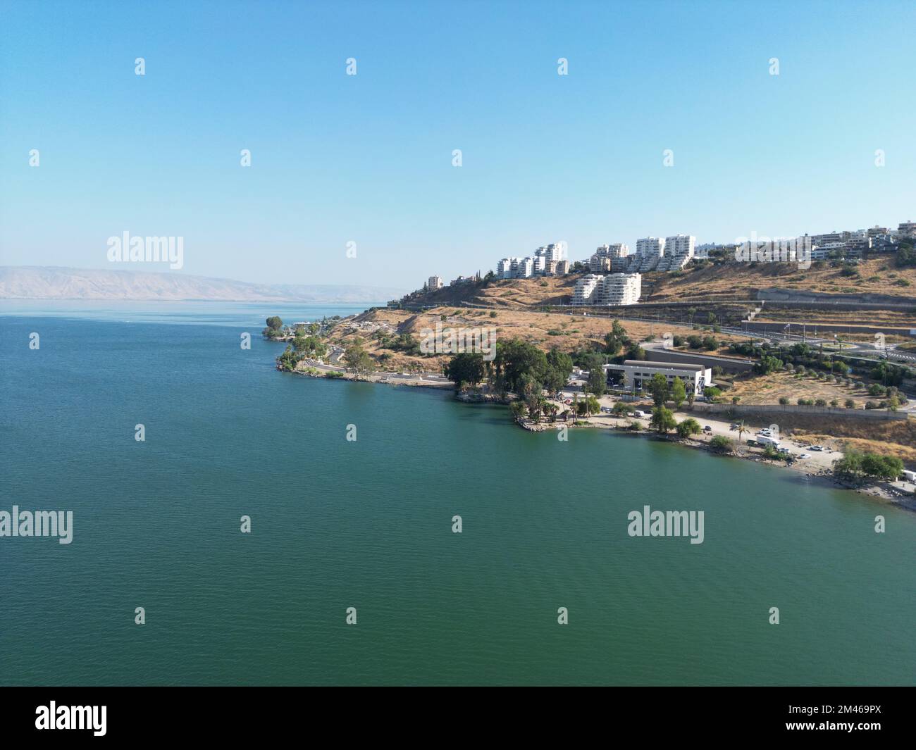 The view of the green sea and city buildings on the hillside. Galilee ...