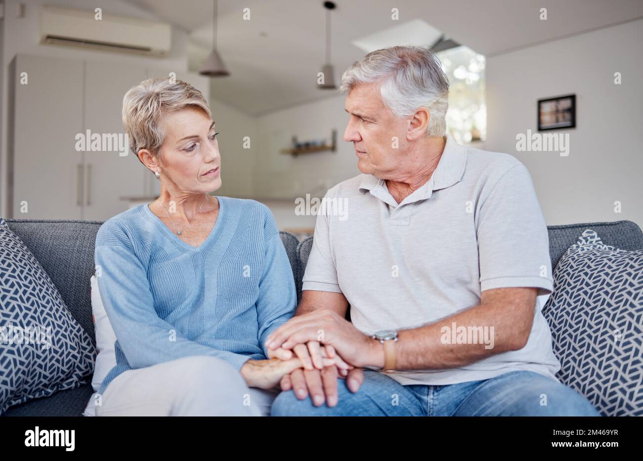 Elderly couple, holding hands and living room of people with support ...